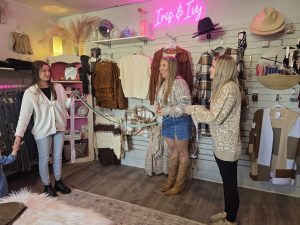 Iris & Ivy cuts ribbon - The Bradford Era