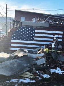 Iconic American flag on historic McCourt Label building preserved - The ...